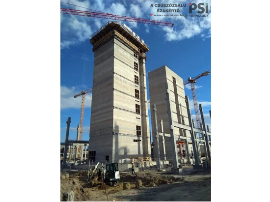 Slipform construction of reinforced concrete core of A1 office building ...